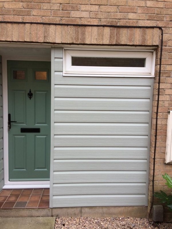 New front door and cladding in Godmanchester - Apple Home Improvements